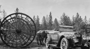 Logging "Big Wheel" Pulling Cars Out of the Mud, 1916